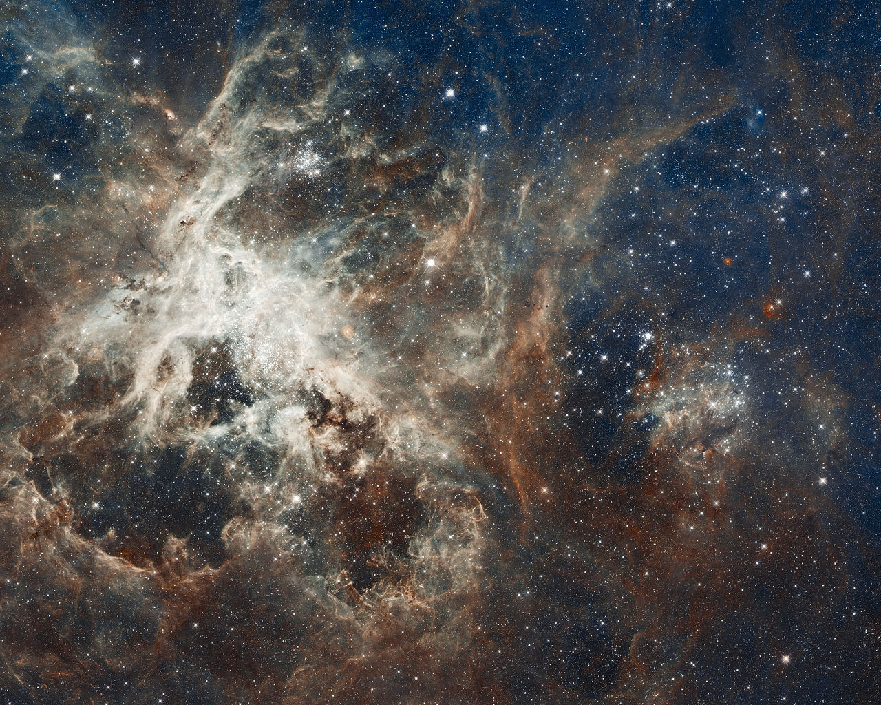 Webb Telescope Captures Images of Cosmic 'Spider' Nebula