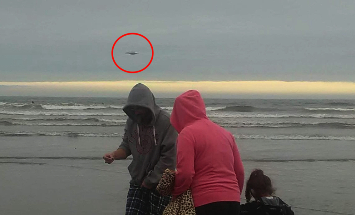 Missouri Family Beach Photo Captures UFO Over the Water